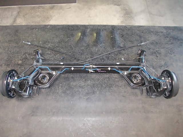 [Used]Rear Axle Beam Assembly NISSAN JUKE DBA-YF15 - BE FORWARD Auto Parts