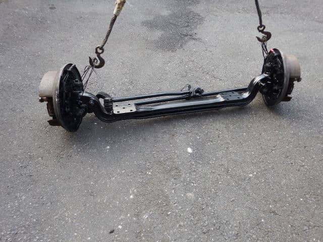 [Used]Front Axle Beam Assembly ISUZU Elf - BE FORWARD Auto Parts