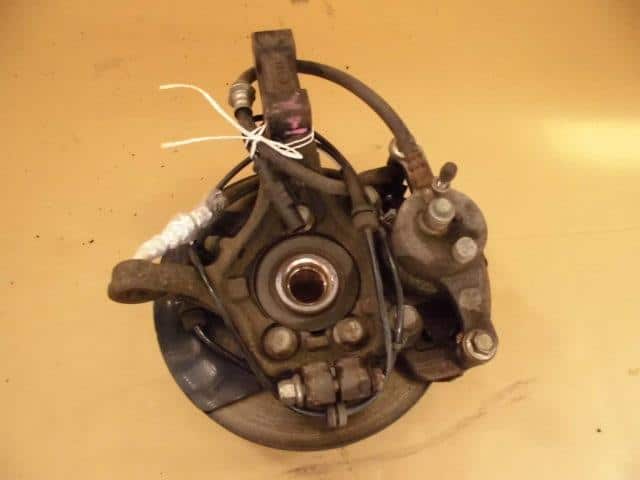 [Used]Tiida C11 Left Front Knuckle ASSY [15332178] - BE FORWARD Auto Parts