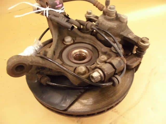 [Used]Tiida C11 Left Front Knuckle ASSY [15332178] - BE FORWARD Auto Parts