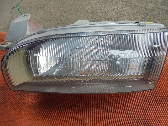 [Used]Sprinter AE100 Left Headlight 12359 - BE FORWARD Auto Parts