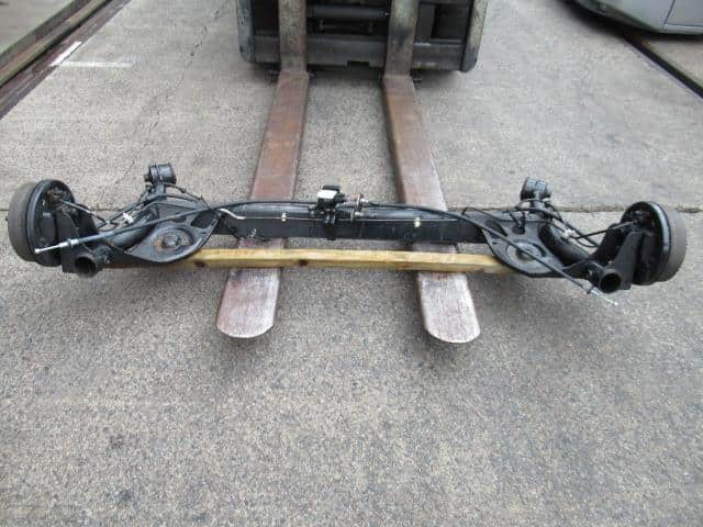 [Used]Note E11 Rear Axle Beam ASSY 555014V00B - BE FORWARD Auto Parts