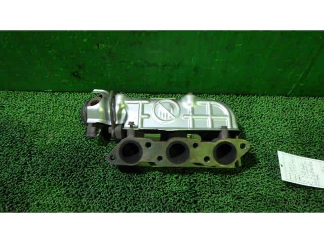 [Used]Carry DA63T exhaust manifold 1411165H21 - BE FORWARD Auto Parts