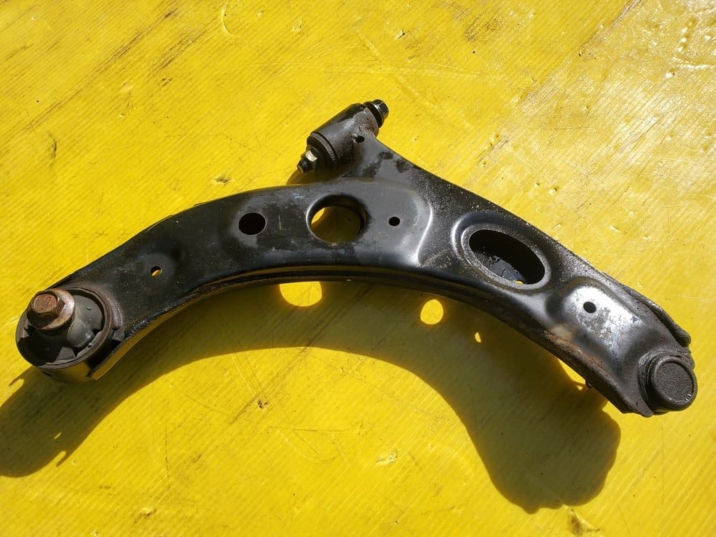 [Used]Lower arm Front Left 48069-B1010 PASSO KGC10 - BE FORWARD Auto Parts