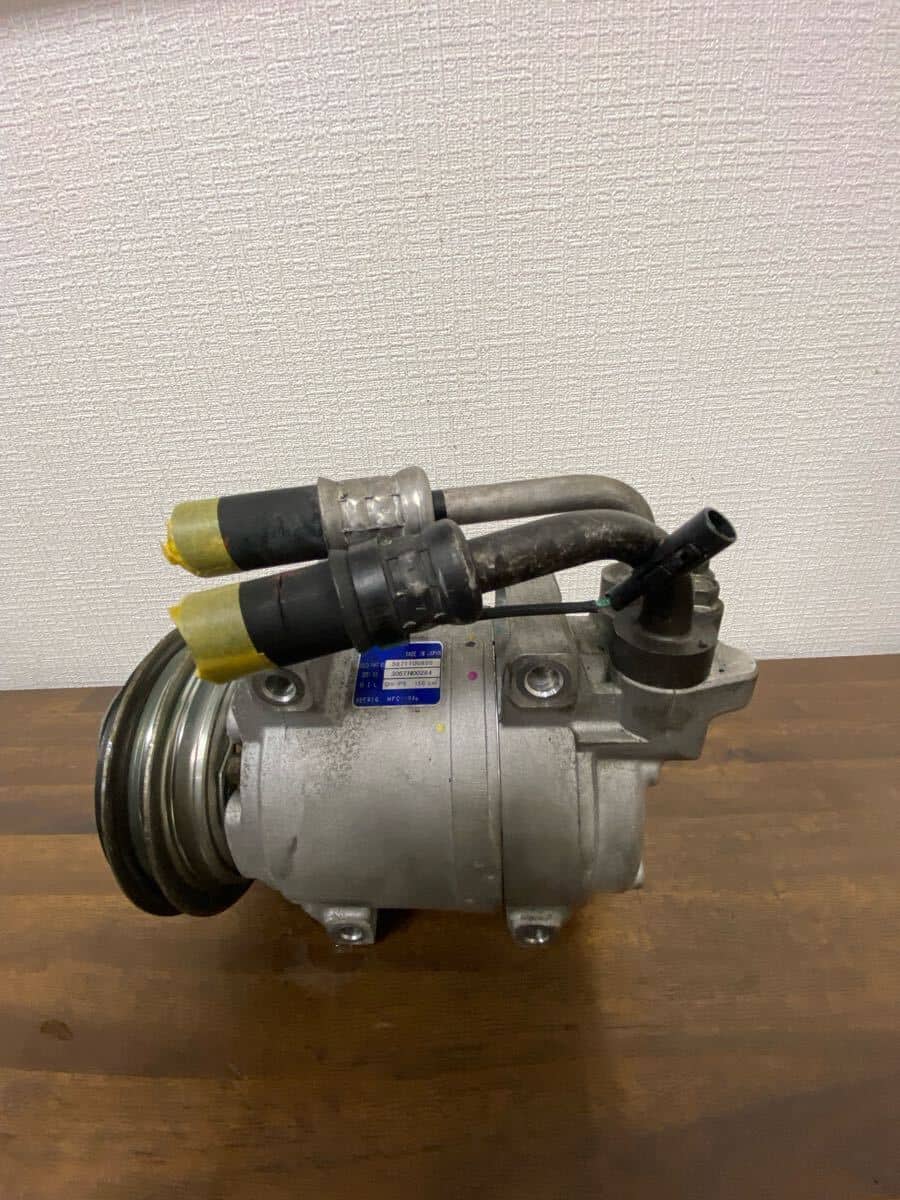 [Used]Air-conditioner compressor isuzu elf 4JJ1 - BE FORWARD Auto Parts